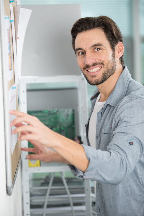 Portrait Male Teacher Stood at Notice Board Stock Image - Image of ...