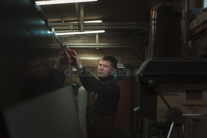 Portrait of a Locksmith in the Workplace Stock Photo - Image of hand ...