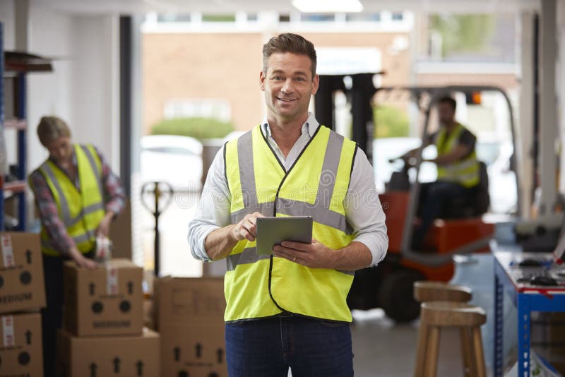 Portrait of Male Worker in Logistics Distribution Warehouse Using ...
