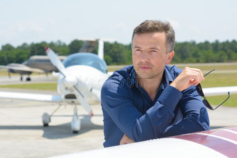 Portrait man and aircraft stock image. Image of biplane - 83016045