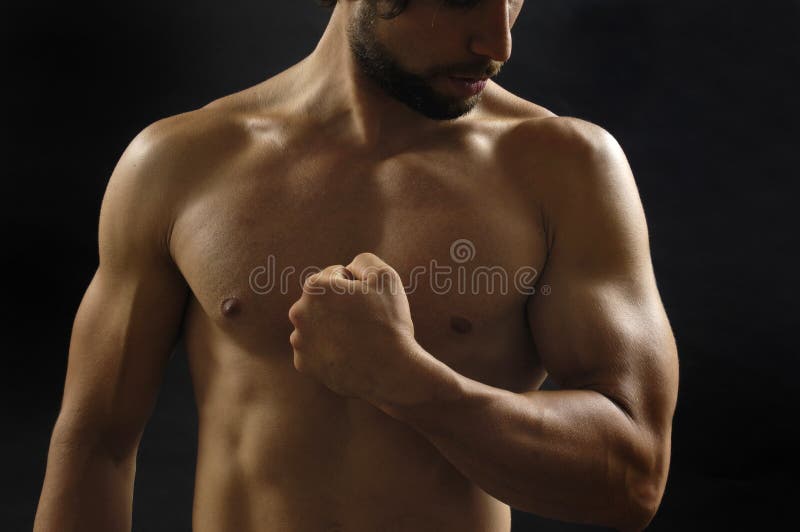 Portrait of a Man with Biceps, Black Background Stock Image - Image of ...
