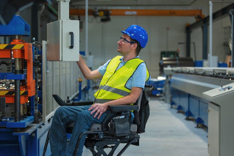 Portrait of a Man with a Blue Helmet and Yellow Vest, a Worker in a ...