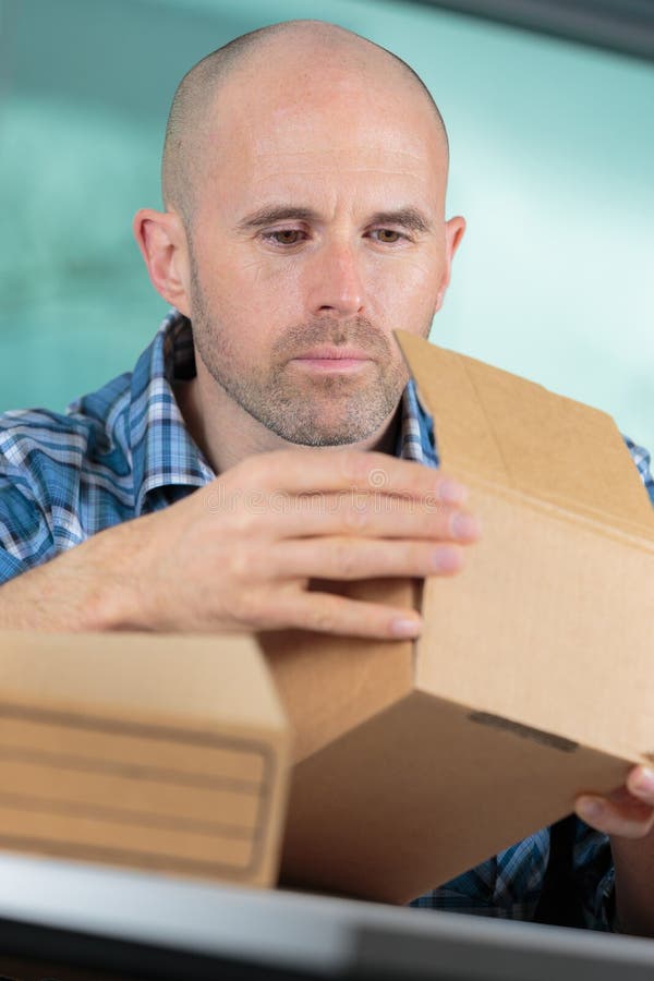 Portrait man with boxes stock image. Image of handyman - 164151413