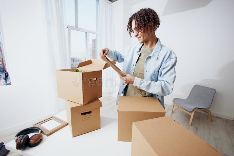 Portrait of a Man with Boxes Moving Sorting Things Out Stock Photo ...