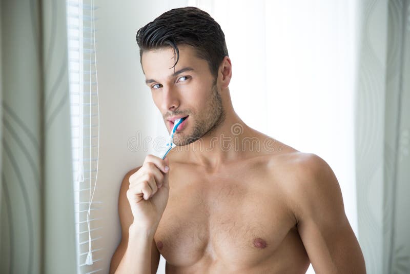 Portrait of a Man Brushing Teeth Stock Photo - Image of home, male ...