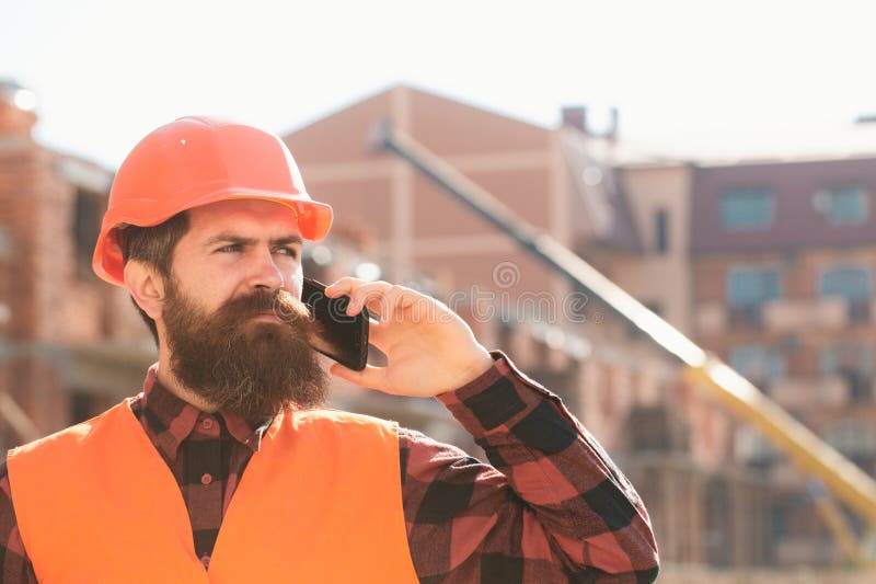 Portrait of Man Builder in Hardhat Working at Construction Site ...