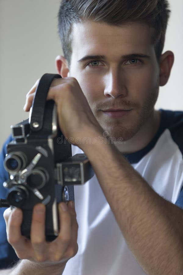 Portrait of a Man with a Camcorder Stock Image - Image of attractive ...
