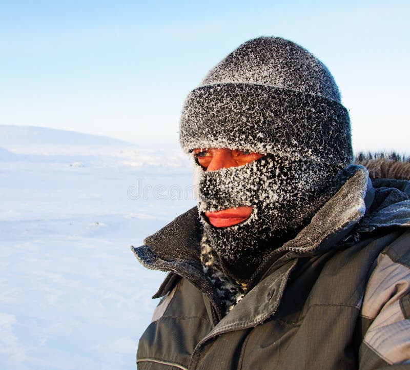 Portrait of a Man in a Cap and a Ski Mask. Stock Photo - Image of ...