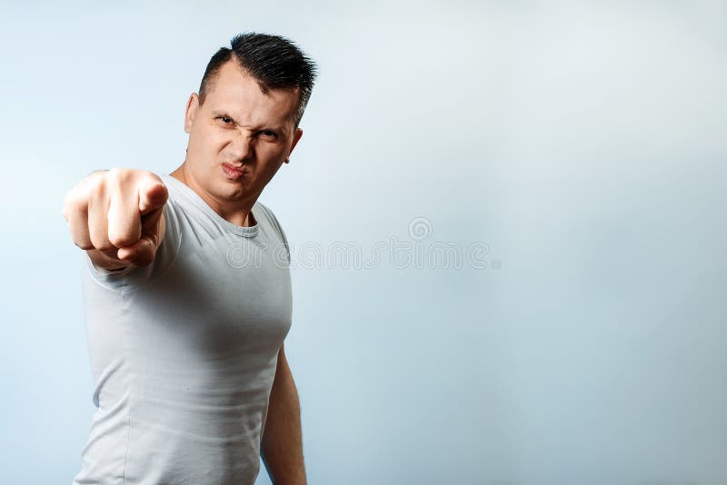 Portrait of a Man Close-up, Experiencing Anger, Hate, Against a Light ...