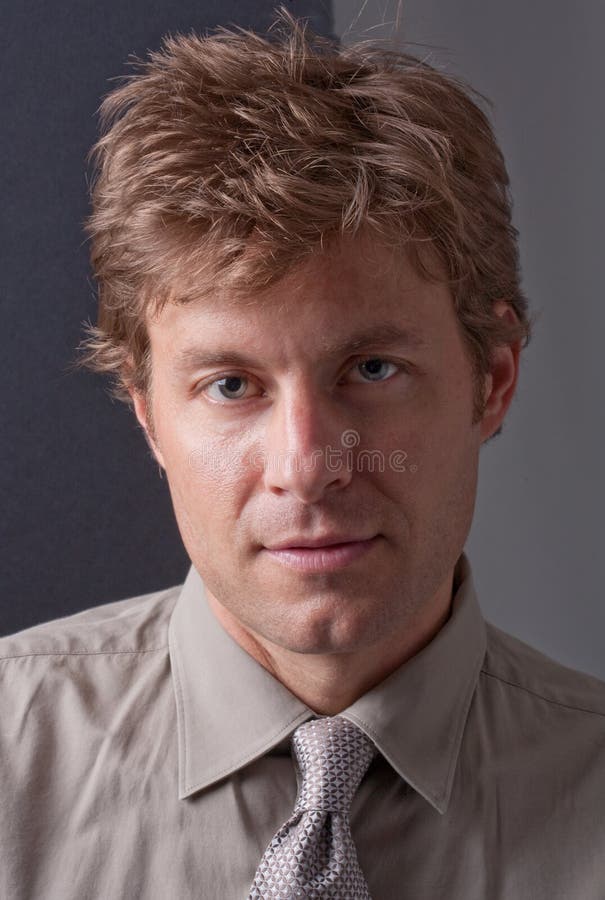 Man Leaning Against Wall stock photo. Image of cement - 13851996