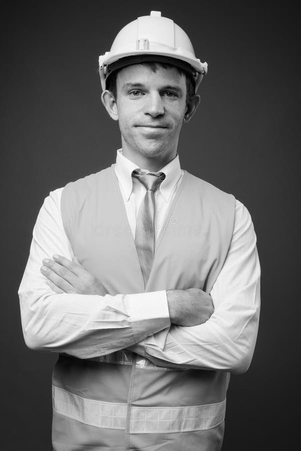 Portrait of Man Construction Worker Against Gray Background Stock Photo ...