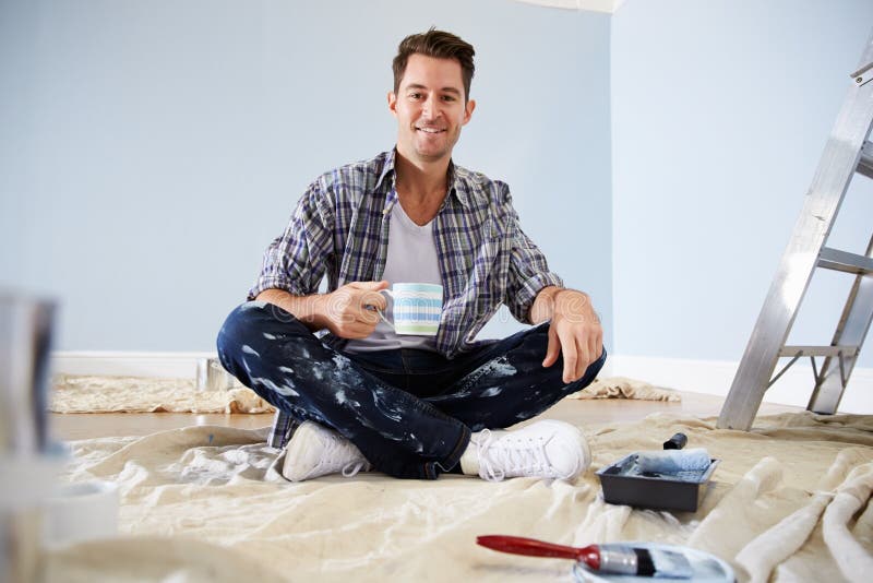 Portrait of Man Decorating Nursery for New Baby Stock Photo - Image of ...