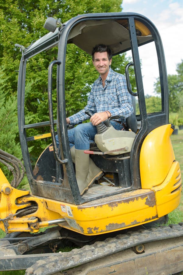 Portrait Of A Bulldozer Driver Stock Image - Image of happy, blue: 40887375