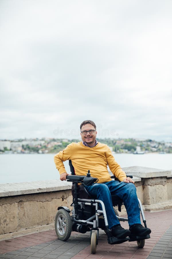 Portrait of a Man with a Disability in a Wheelchair Stock Photo - Image ...