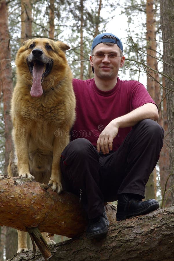 Middle aged man with a dog stock photo. Image of cuddling - 25762804