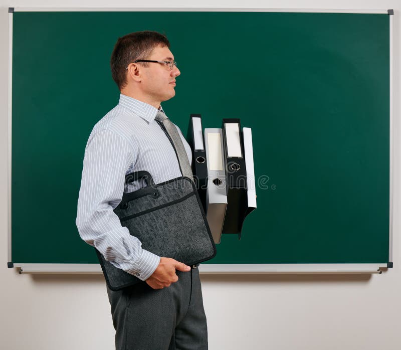 Portrait of a Men Dressed in Business Suit with Folders, Documents and ...