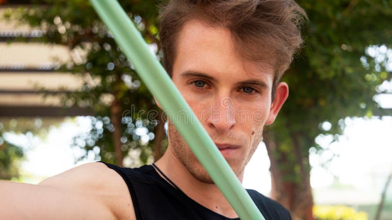Portrait of a Man with an Elastic Band that Covers His Face a Little ...