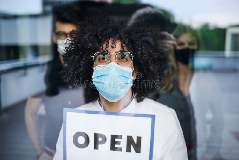 Portrait of Man with Face Mask Holding Open Sign, Quarantine and ...