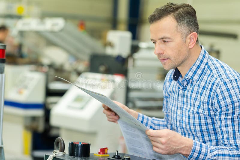 Portrait man in factory stock photo. Image of alone - 234075848