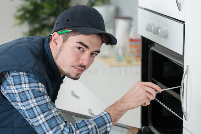 Portrait Man Fitting New Oven Stock Photo - Image of installation ...