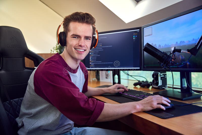 Portrait of Man Gaming at Home Sitting at Desk with Multiple Monitors ... Portrait of Man Gaming at Home Sitting at Desk with Multiple Monitors ...