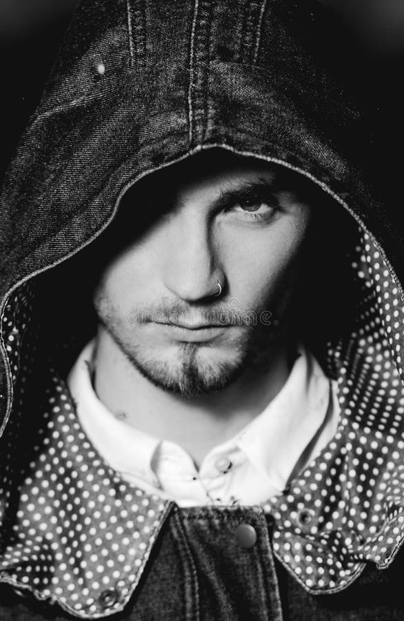Portrait of man with hood stock photo. Image of camera - 125591310