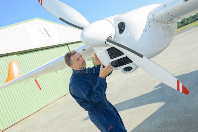 Portrait Man Inspecting Propeller Stock Image - Image of parts, work ...