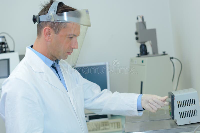 Portrait man in laboratory stock photo. Image of operate - 197678150