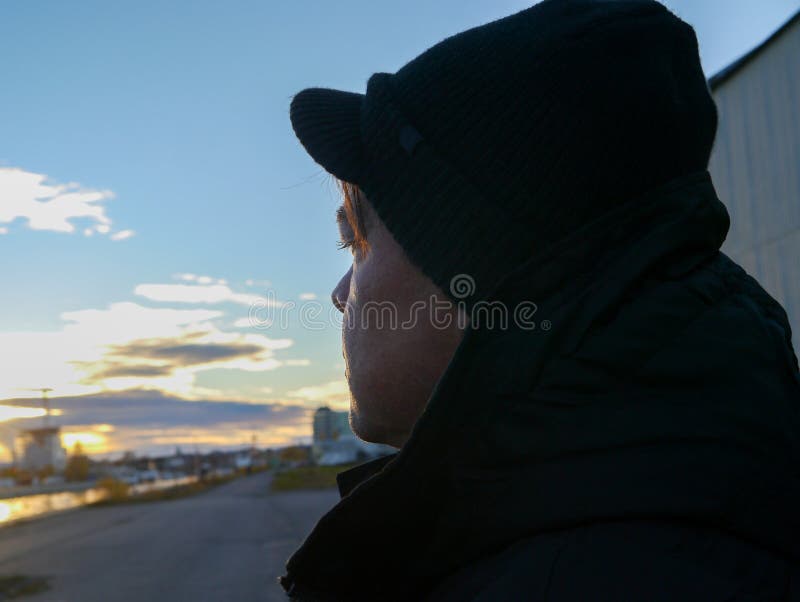Portrait of a Man Looking Away at Sunset Stock Image - Image of horizon ...