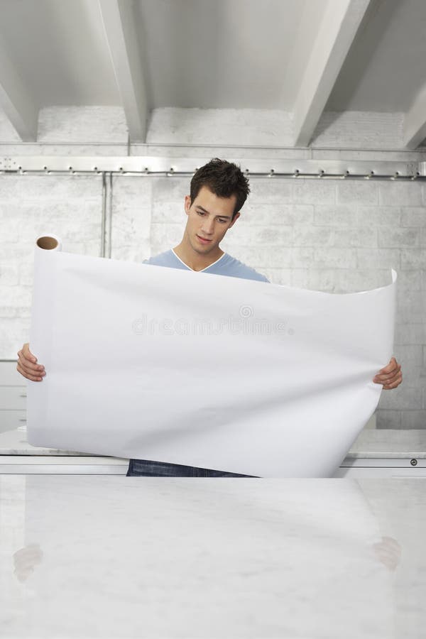 Portrait of Man Looking at Building Plan Stock Photo - Image of beamed ...