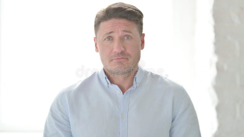 Portrait of Man Looking at the Camera, Sad Expression Stock Image ...