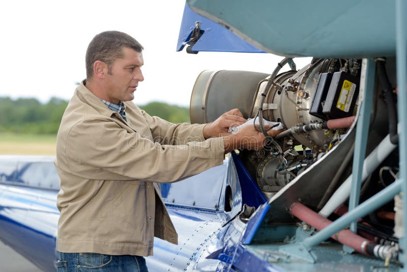 Portrait Man Looking at Engine Stock Image - Image of adult, parked ...