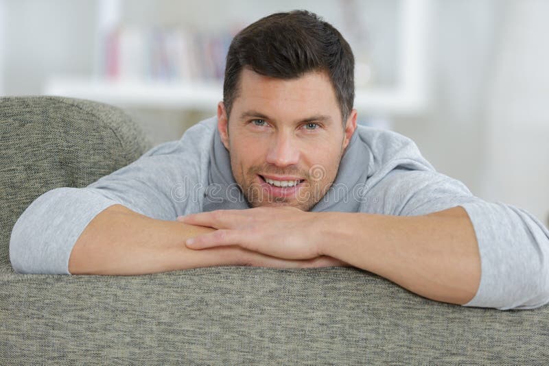 Portrait Man Looking Over Back Sofa Stock Photo - Image of facial ...