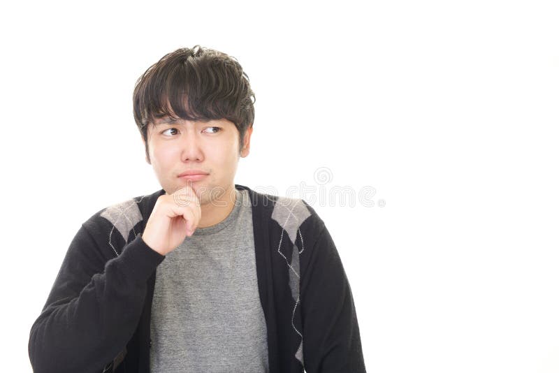 Uneasy Asian man stock image. Image of frustration, handsome - 109226287