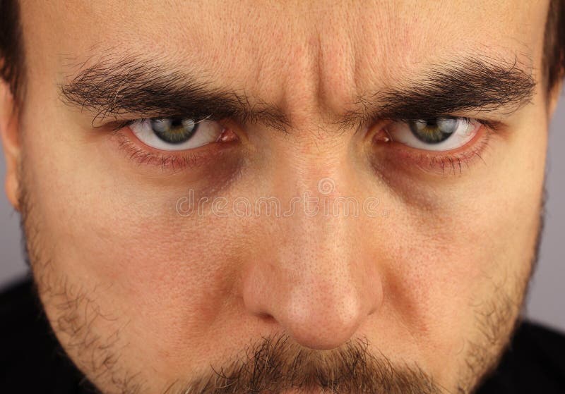 Male eye, menacing-looking stock image. Image of gaze - 31506103