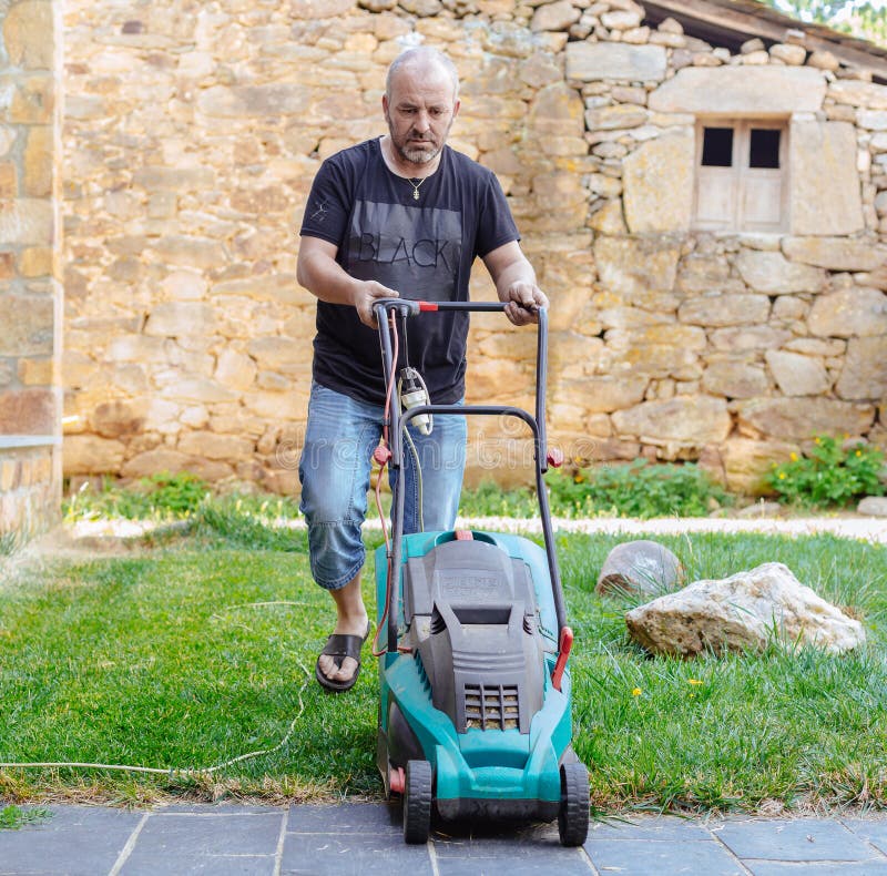 Portrait of Man Mowing Lawn Stock Photo - Image of grass, adult: 78788776