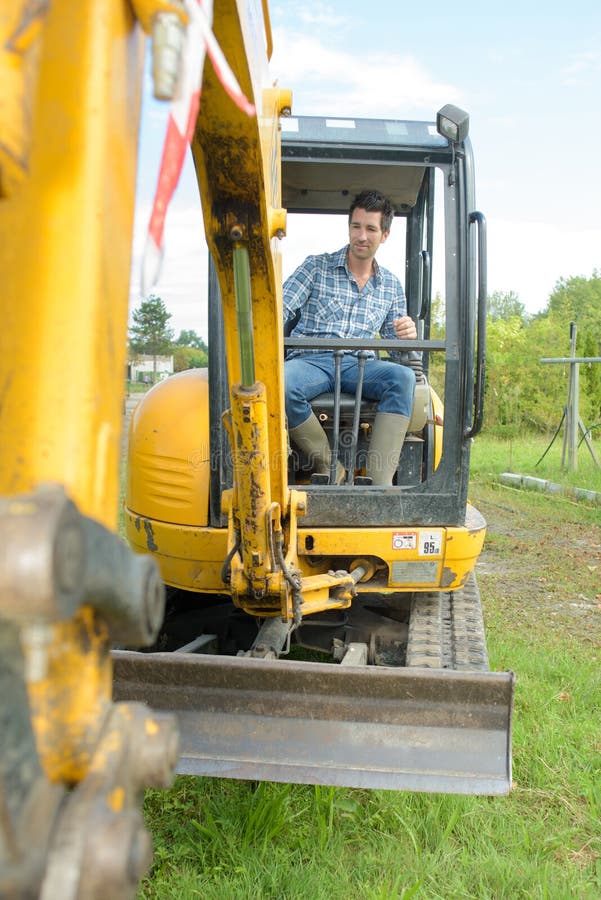 Portrait Man Operating Backhoe Stock Photo - Image of digging, process ...