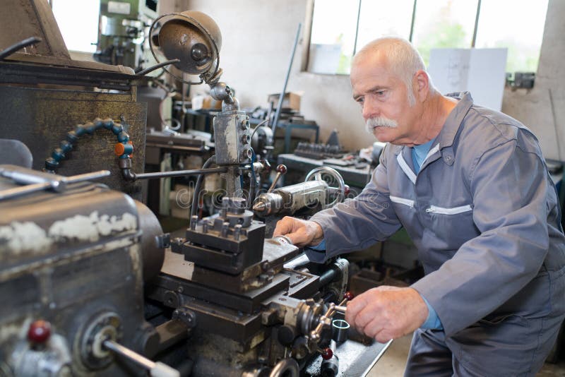 Portrait Man Operating Industrial Machine Stock Photo - Image of ...