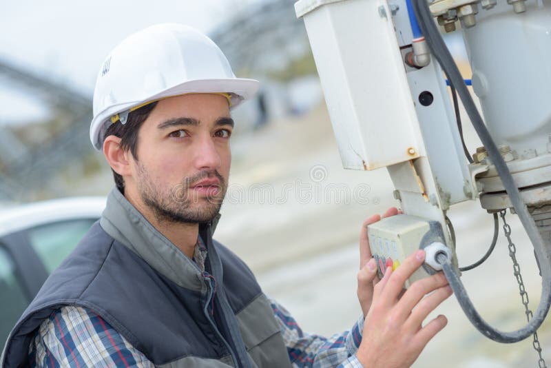 Portrait Man Operating Machinery on Construction Site Stock Photo ...