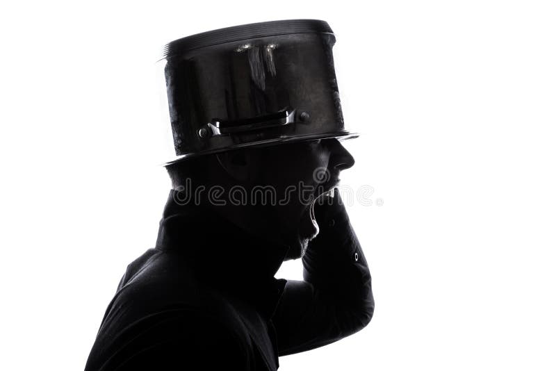 Serious Man with Stew Pan on Head Stock Photo - Image of male, frown ...
