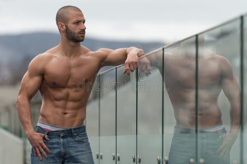 Man Posing Outdoors stock image. Image of adult, bodybuilder - 163139465