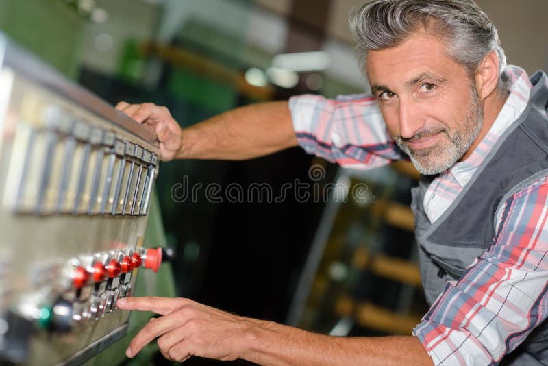 Portrait Man Pressing Button on Machine Stock Image - Image of ...