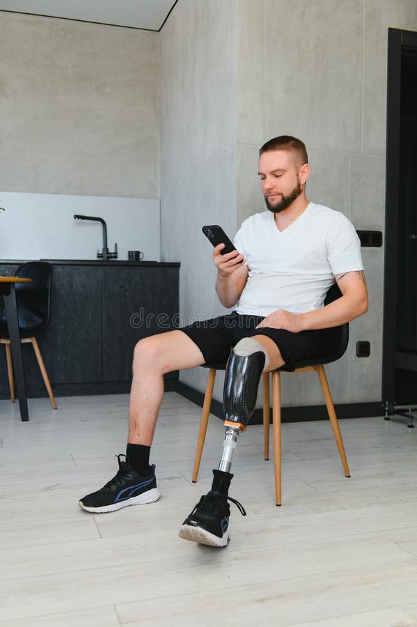 Portrait of Man with Prosthetic Leg at Home, Copy Space Stock Image ...