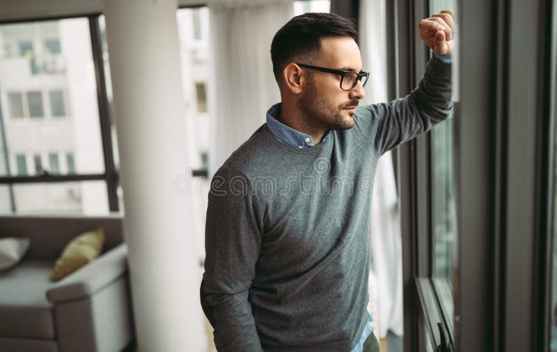 Portrait of Man Resting at Home and Thinking about the Future Stock ...