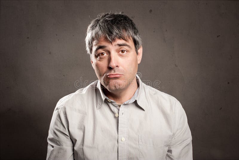Man with sad expression stock photo. Image of person - 107589848