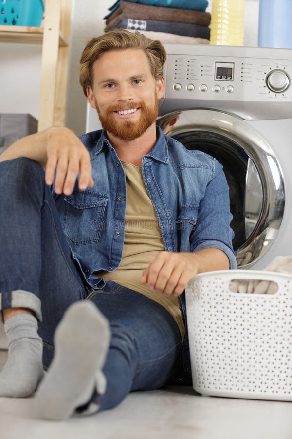 Portrait Man Sat in Laundry Room Stock Image - Image of homemaker ...