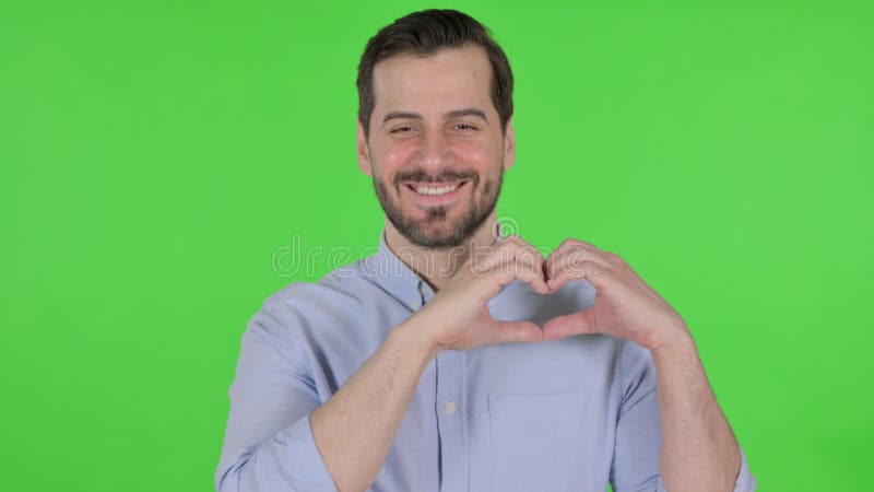 Portrait of Man Showing Heart Shape by Hands, Green Screen Stock Photo ...