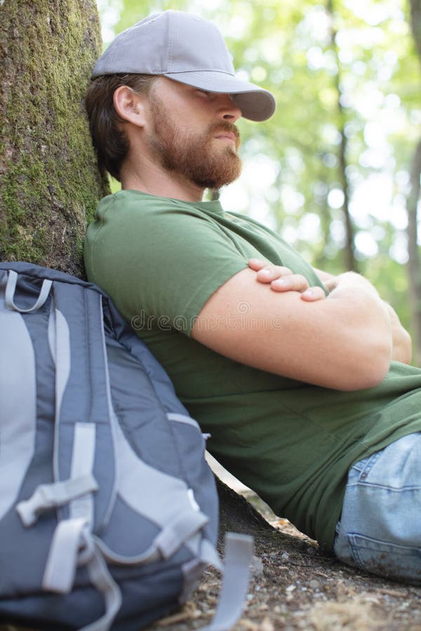 Portrait Man Sitting by Tree with Resting Stock Photo - Image of tent ...