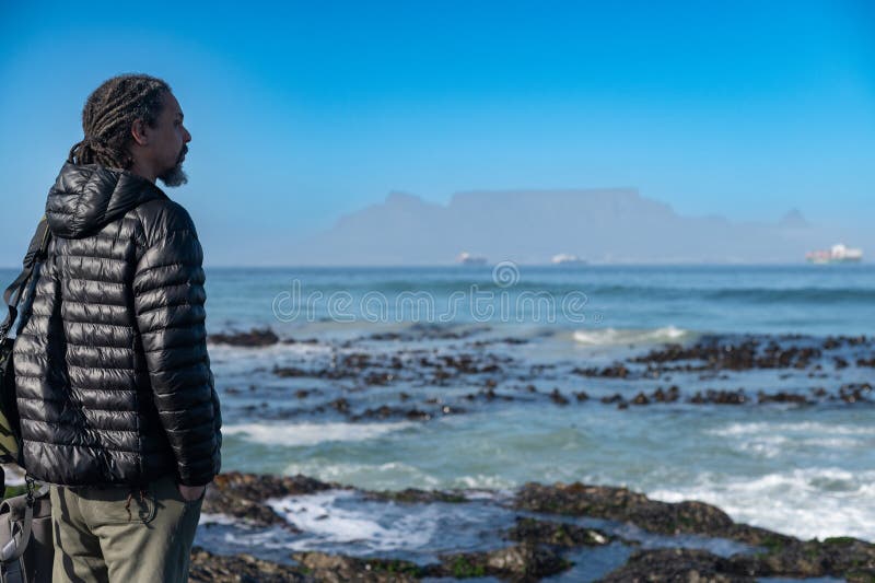 Man Standing and Looking at Ocean Stock Photo - Image of people ...