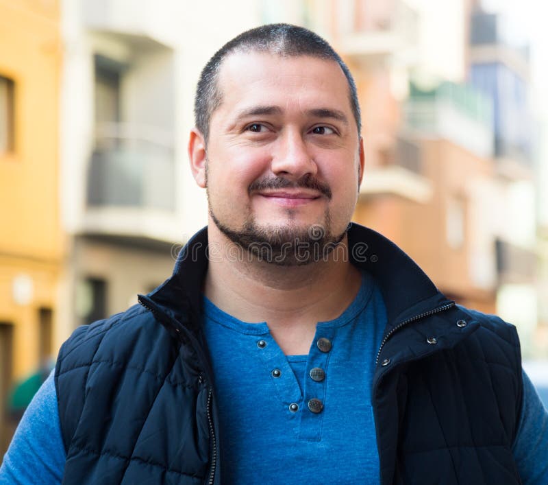 Portrait of Man Standing on Street in a Blue Jacket Stock Image - Image ...